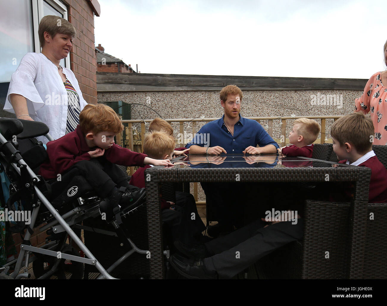 Prince Harry meets Oliver Rooney (left) who has Wolf Hirschhorn ...