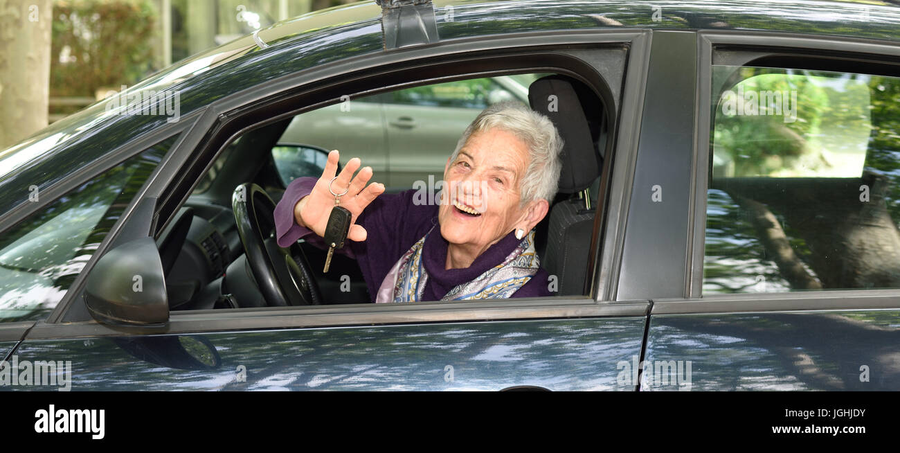senior woman driving a car Stock Photo - Alamy