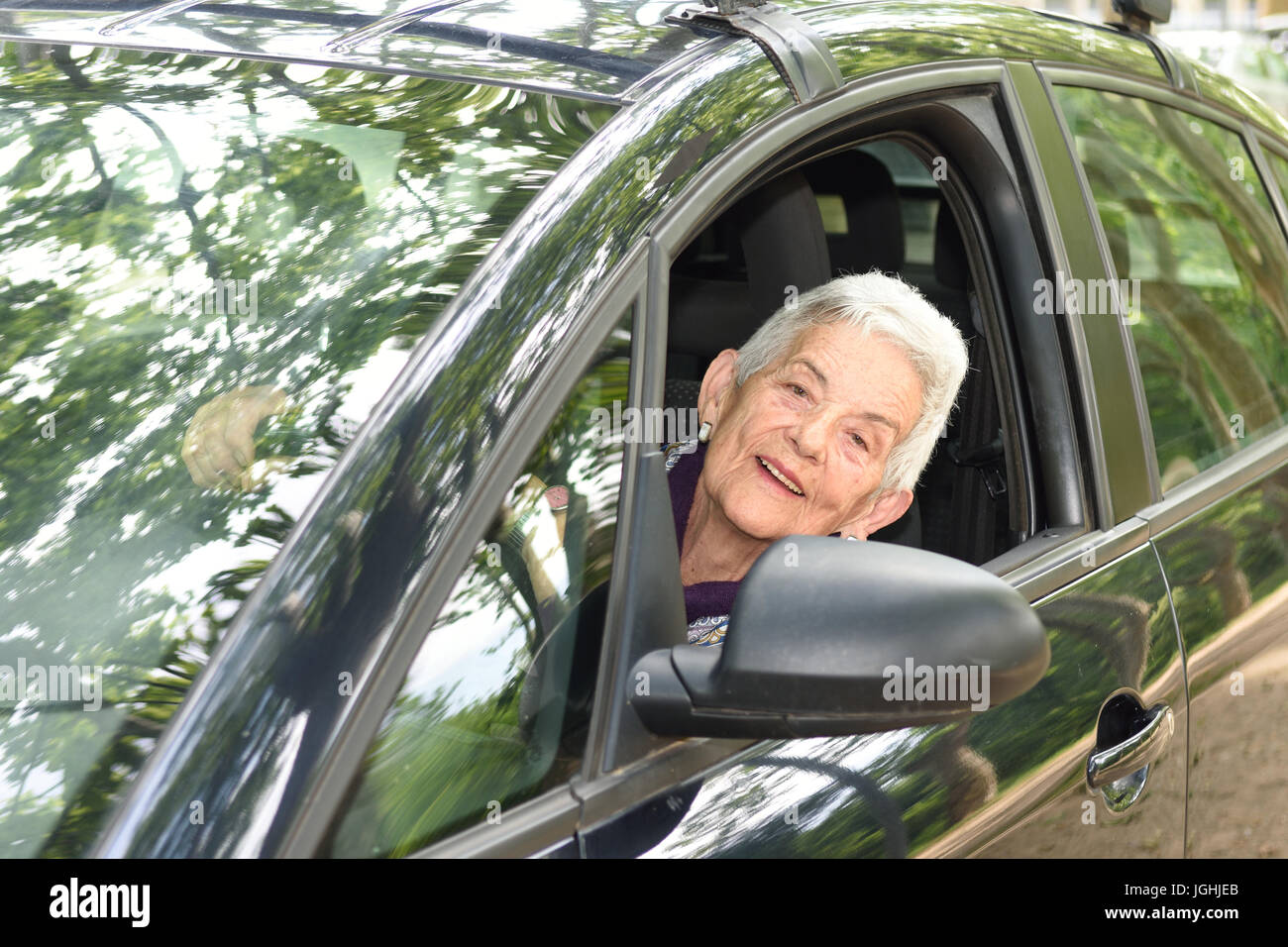 senior woman driving a car Stock Photo - Alamy