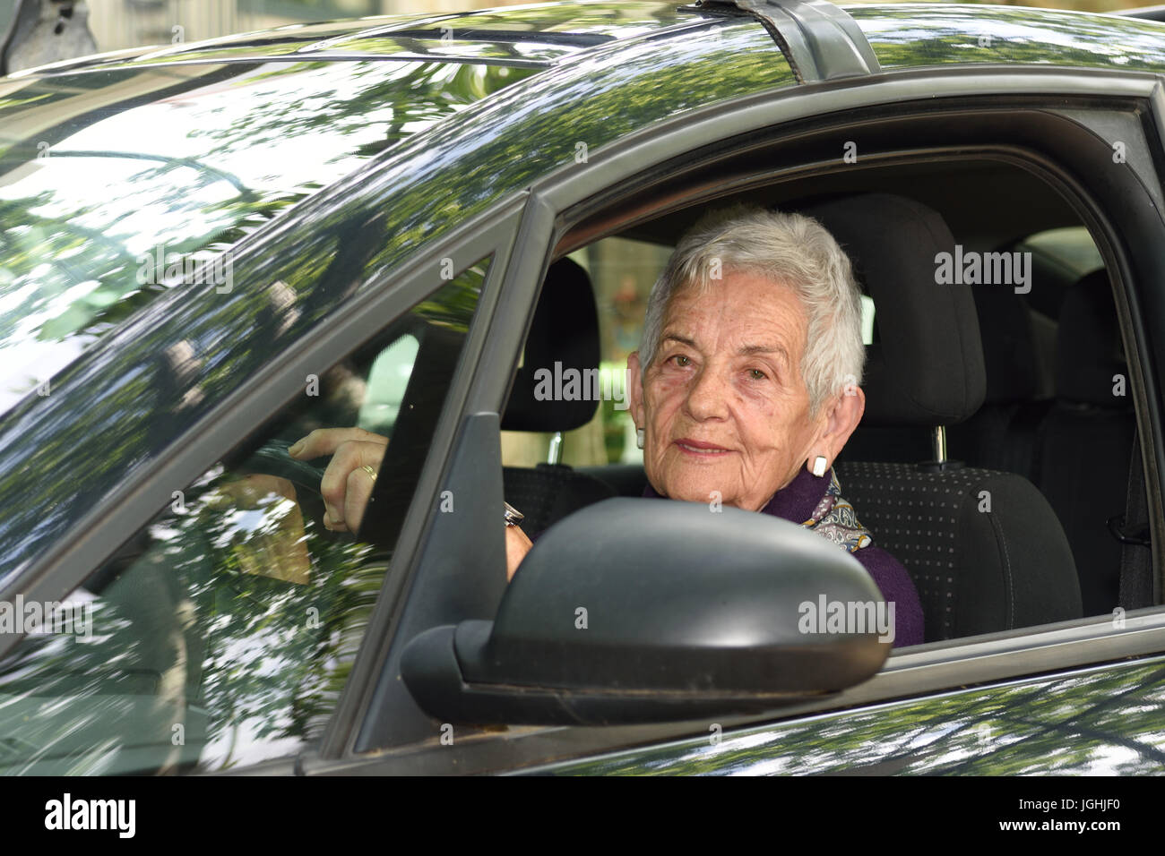 senior woman driving a car Stock Photo - Alamy
