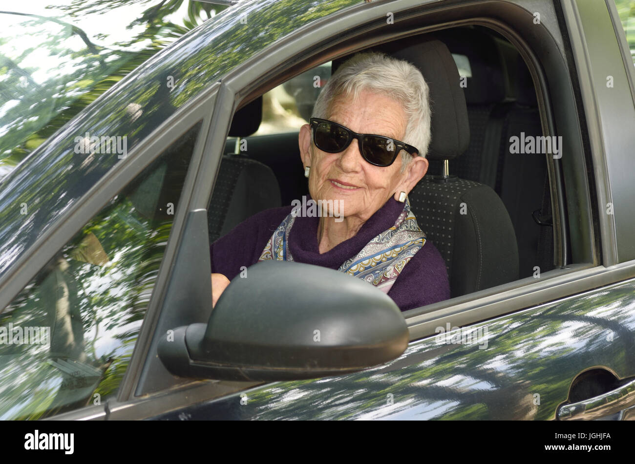 senior woman driving a car Stock Photo - Alamy