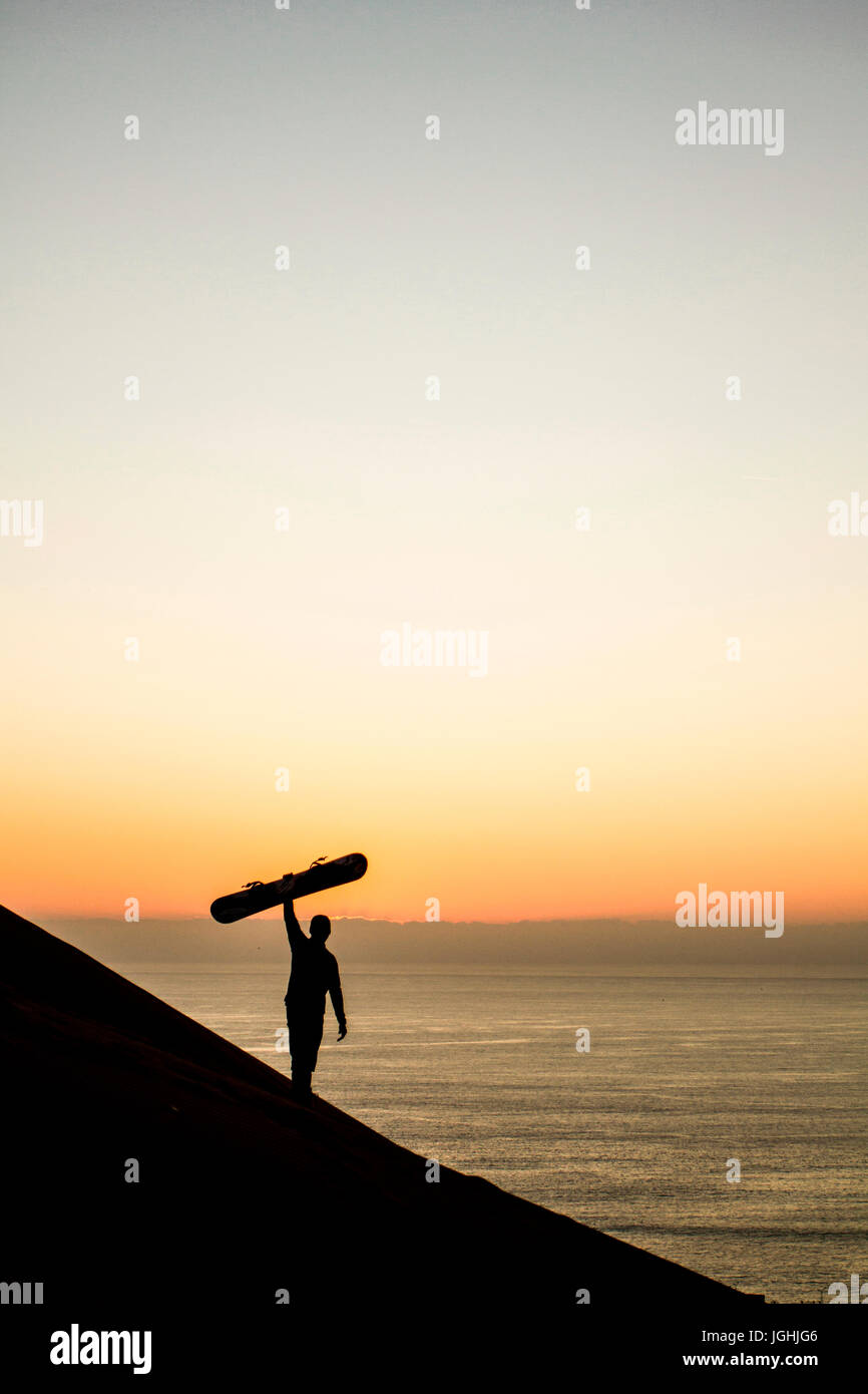 Sandboarding on Atacama Desert. Iquique, Tarapaca Region, Chile. 15.11. ...