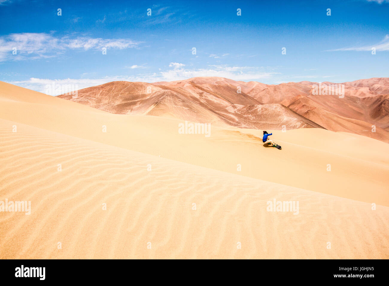 Sandboarding on Atacama Desert. Iquique, Tarapaca Region, Chile. 14.11. ...