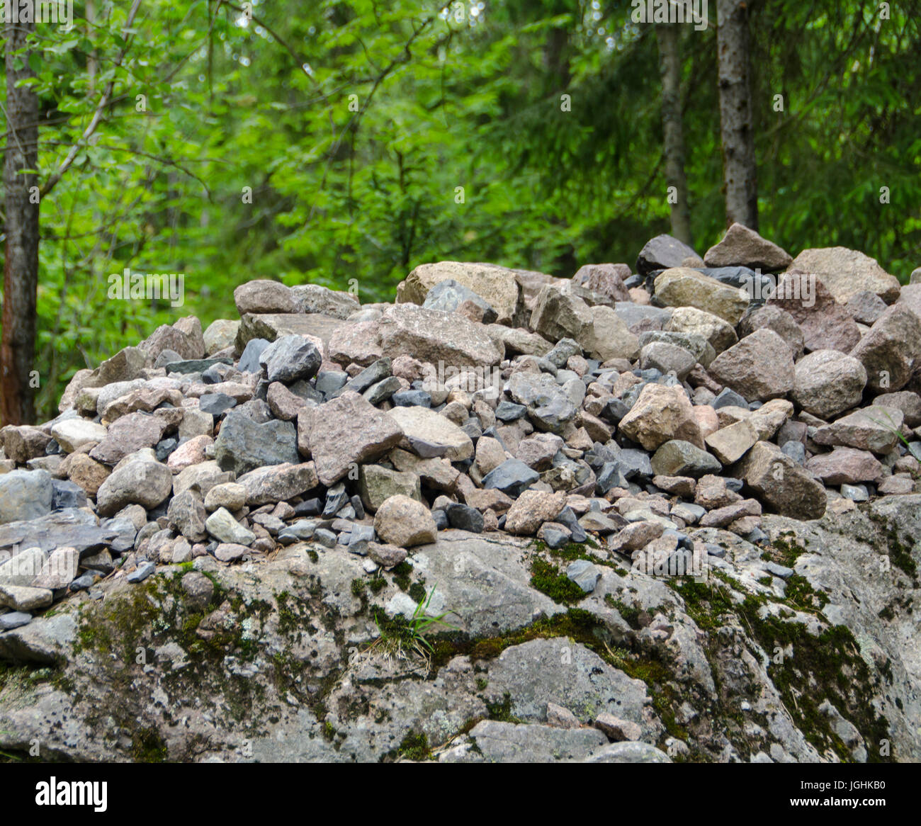 A large pile of rocks on top of a boulder Stock Photo - Alamy