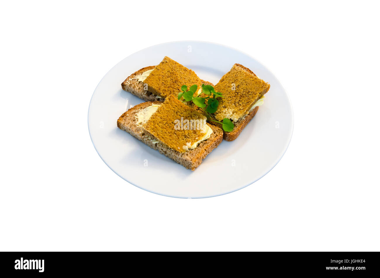 Isolated plate with Norwegian old cheese Stock Photo - Alamy