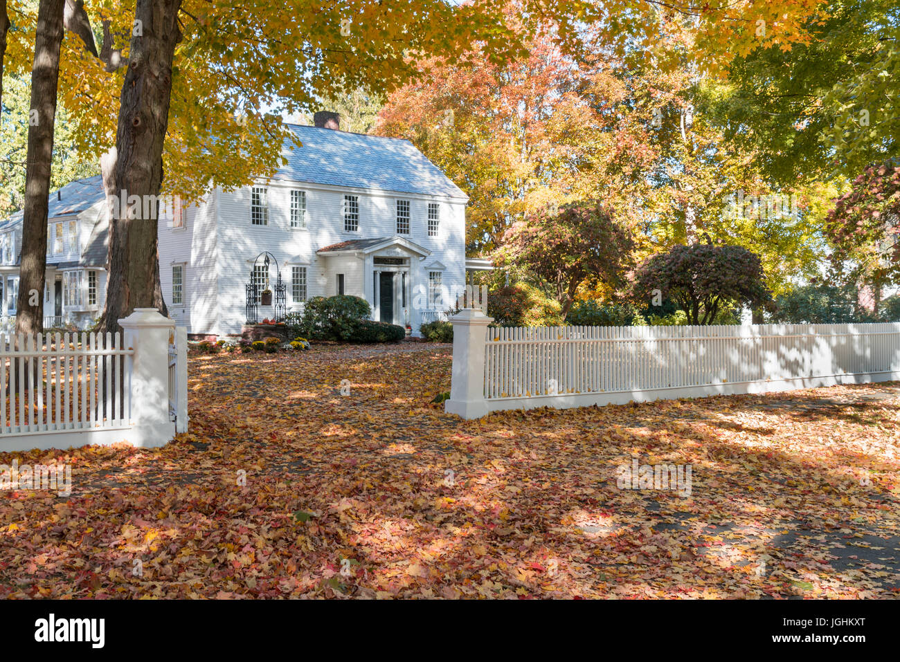 Historic federal style home with a white picket fence in Deerfield ...