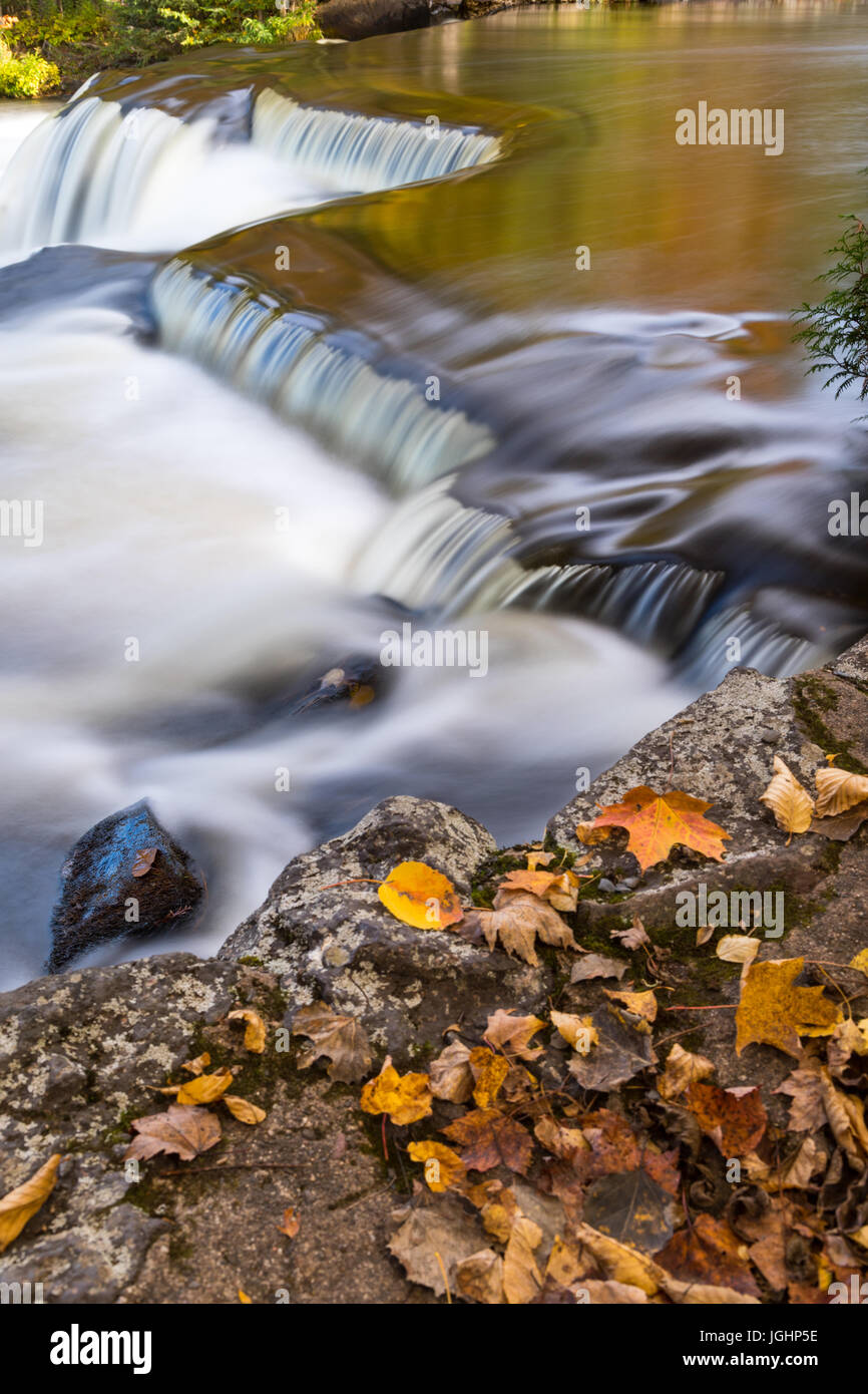 The Ontongan River spills over Upper Bond Falls in the Upper Peninsula ...