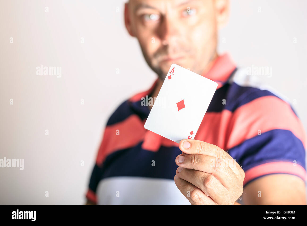 Person cheating playing cards hi-res stock photography and images - Alamy