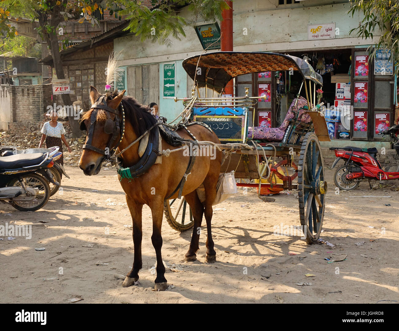 Bagan, Myanmar - Feb 20, 2016. A horse cart on rural road in Bagan ...