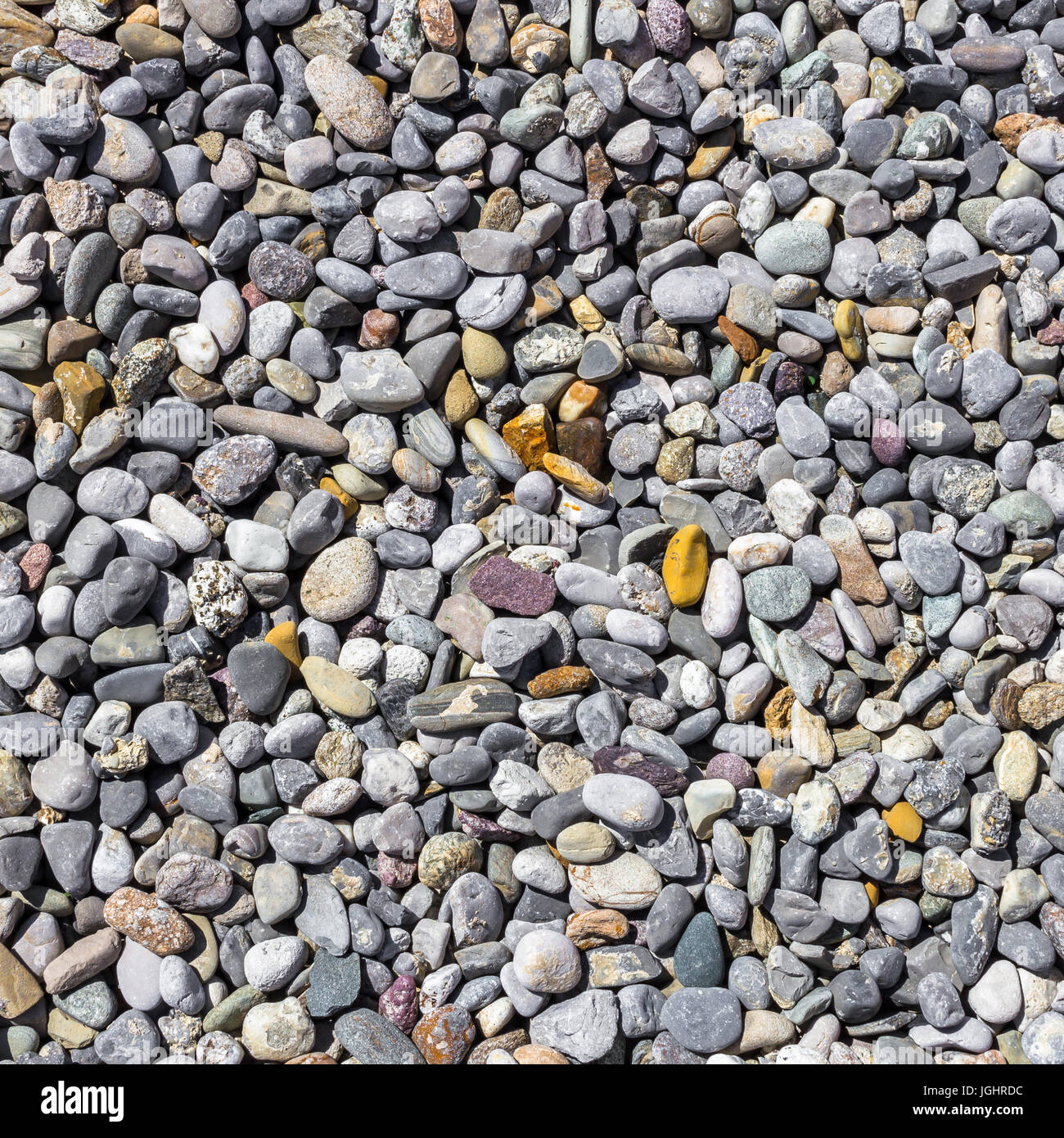 Background of small stones with cool shades Stock Photo - Alamy