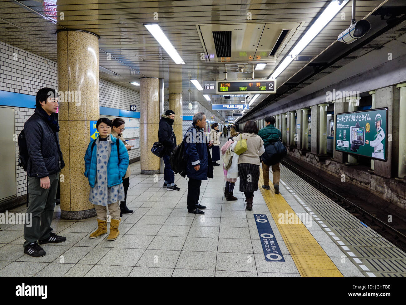 Tokyo, Japan - Jan 3, 2016. People waiting for train at the JR station ...