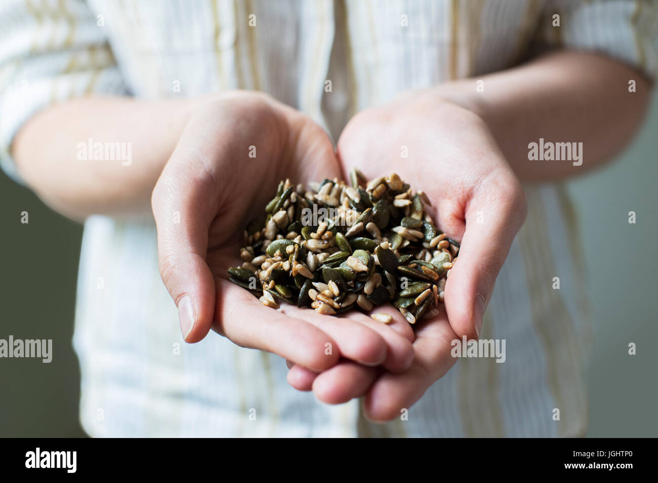Sunflower seeds woman hi-res stock photography and images - Alamy