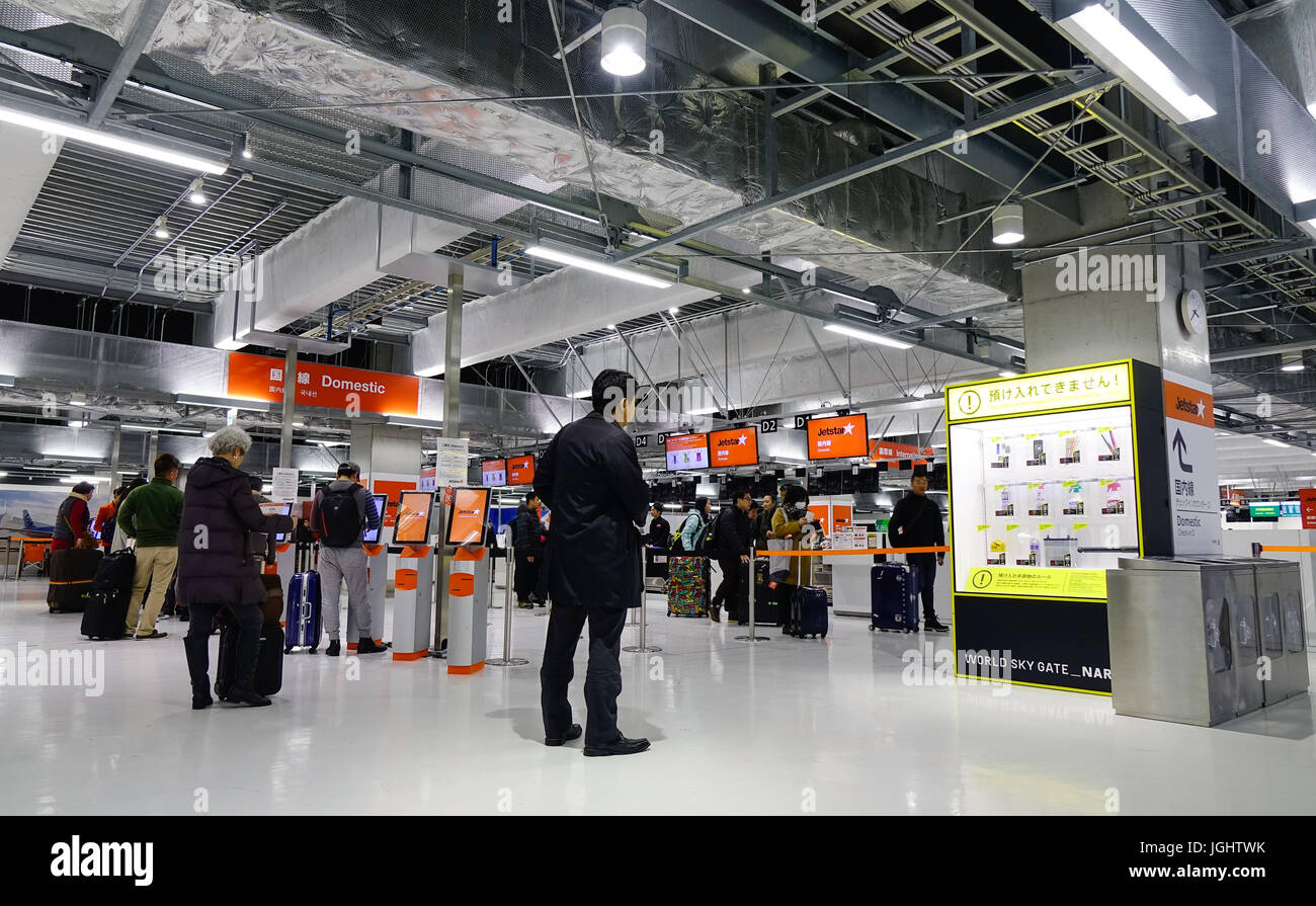 Tokyo, Japan - Dec 7, 2016. People waiting at Check-in Counters of ...