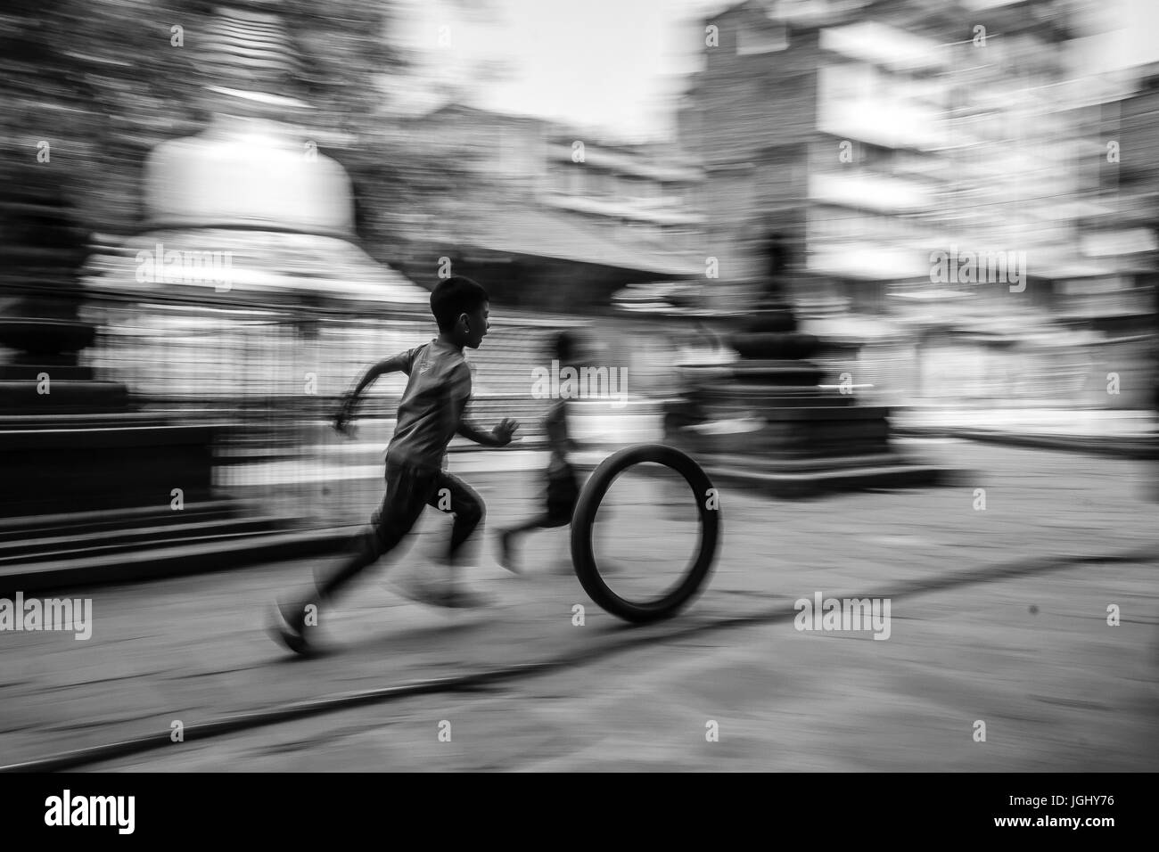 A boy playing Stock Photo - Alamy