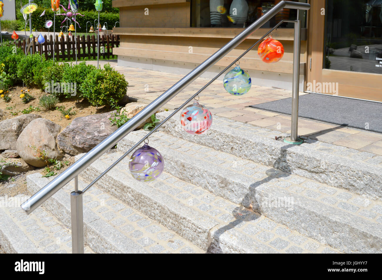 Stainless steel staircase with four handmade glass balls Stock Photo ...