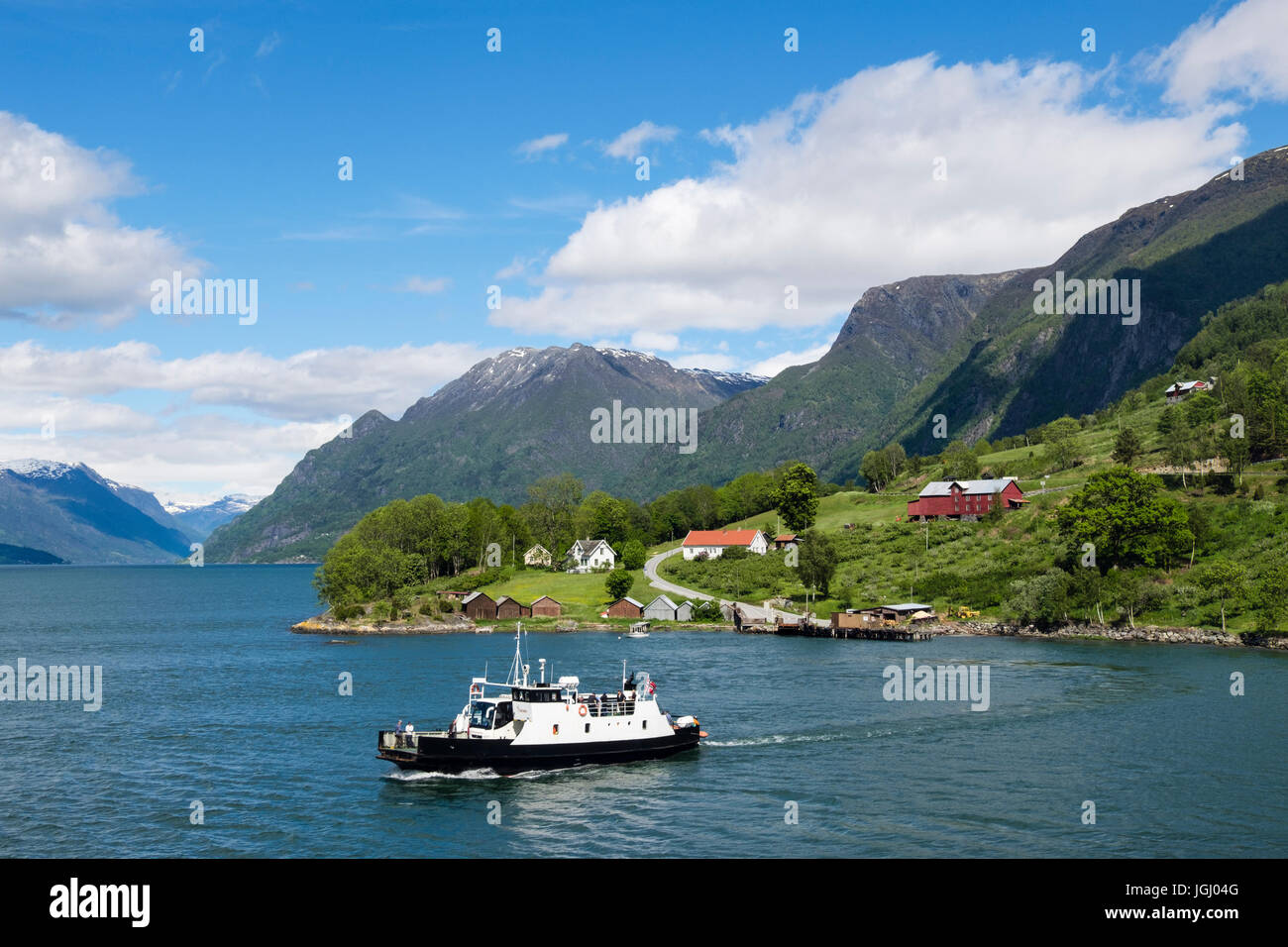 Small ferry crossing Lustrafjorden (innermost arm of Sognefjorden) from ...