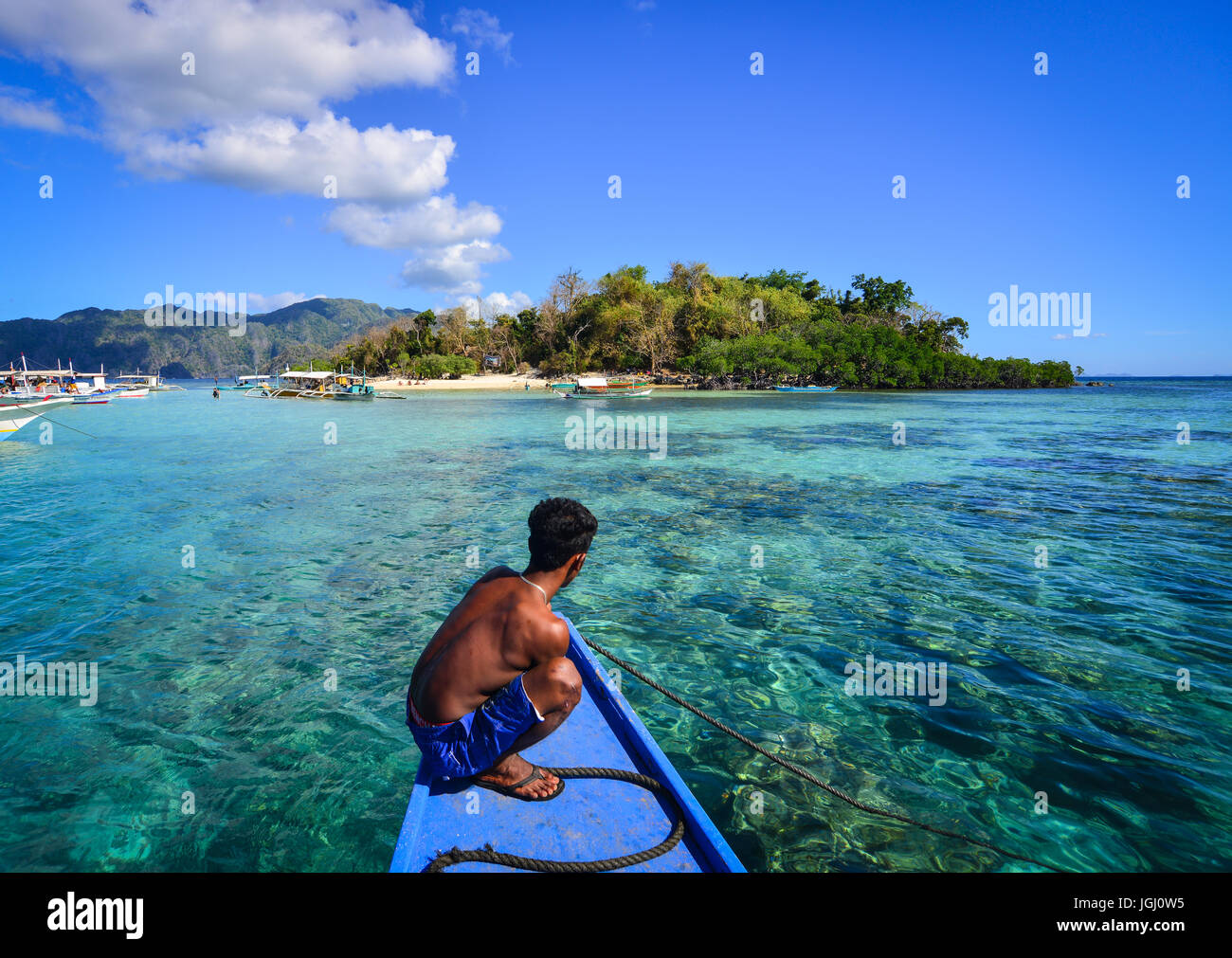 Coron, Philippines - Apr 9, 2017. A tour guide on boat in Coron ...