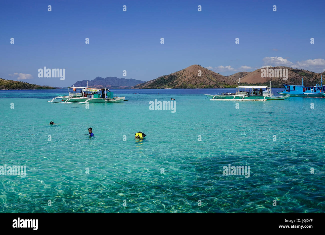 Palawan, Philippines - Apr 11, 2017. Many people swimming on the sea ...