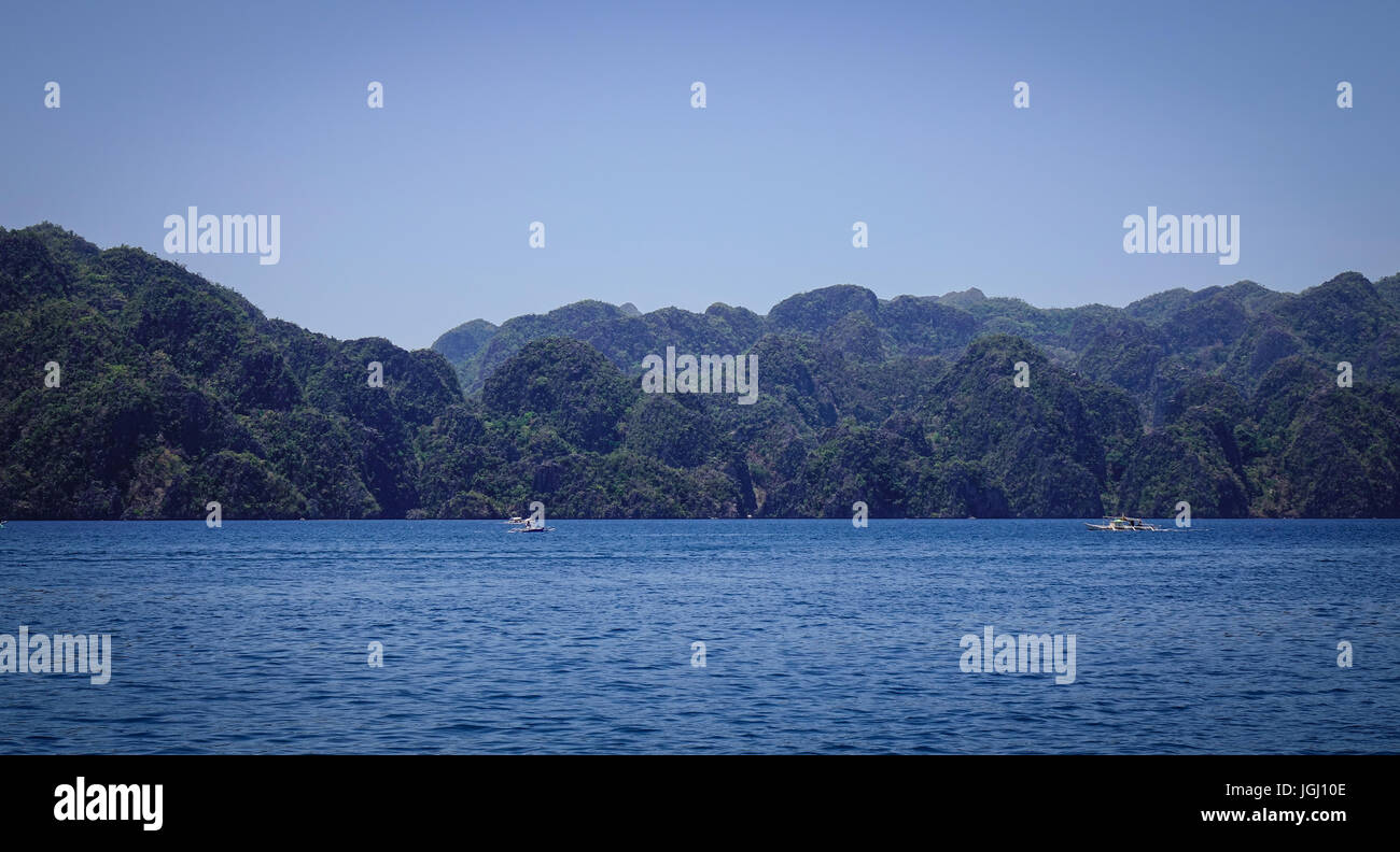 Many green islands with blue sea at sunny day in Palawan, Philippines ...