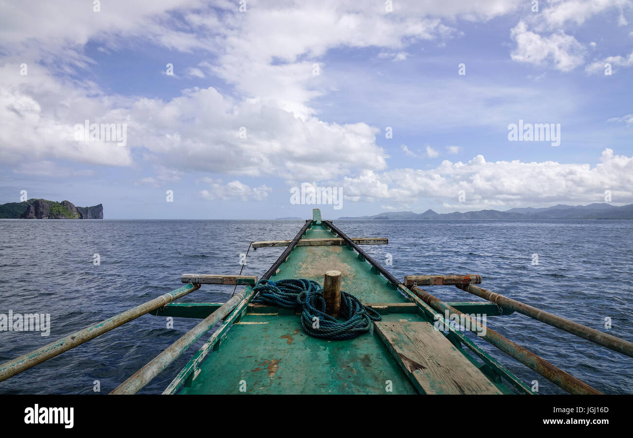 A wooden boat on the sea in Coron Island, Philippines. Coron is one of ...