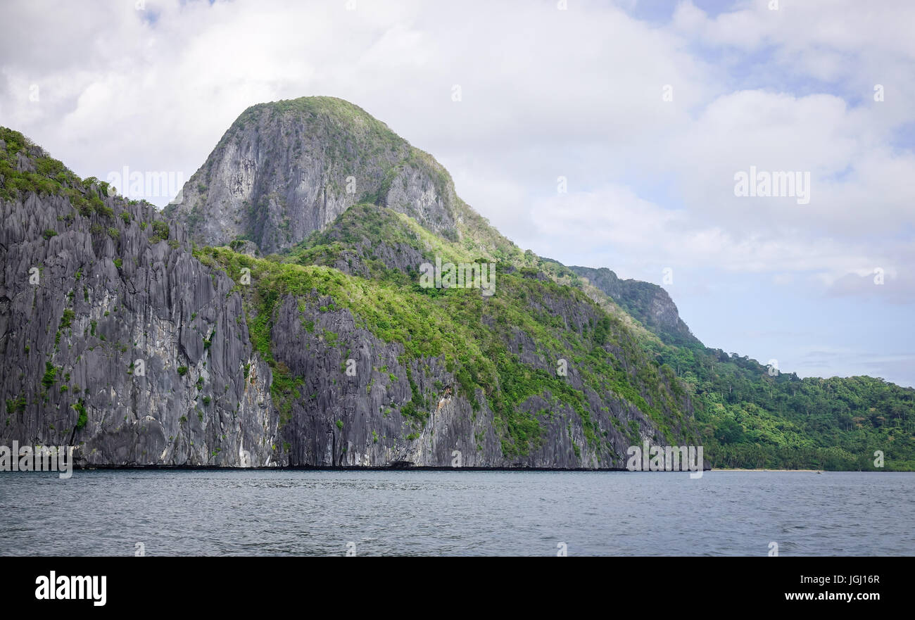 Coron Island at sunny day in Philippines. Coron Island is a wedge ...