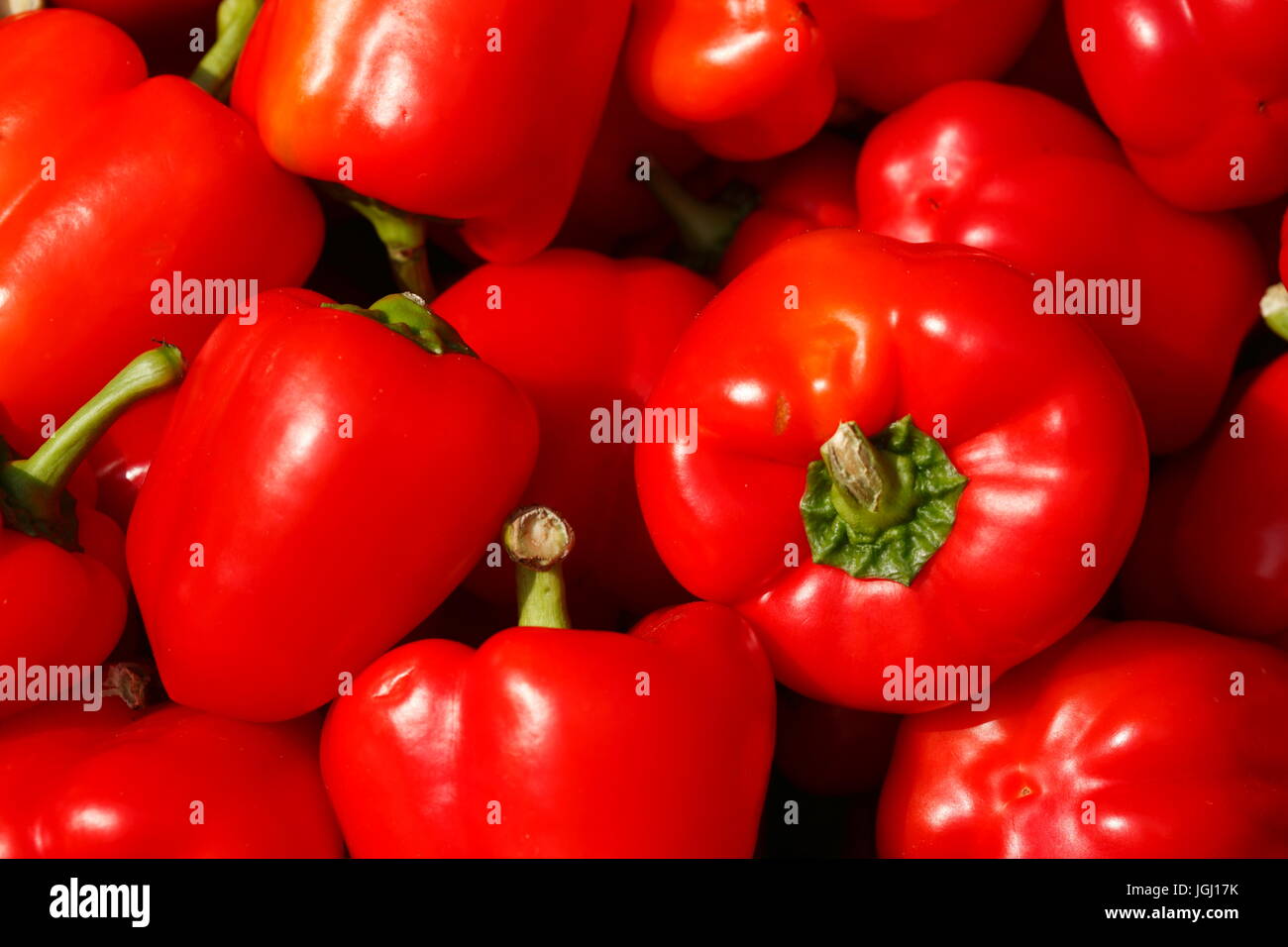 fresh Red peppers on a market stall Stock Photo - Alamy