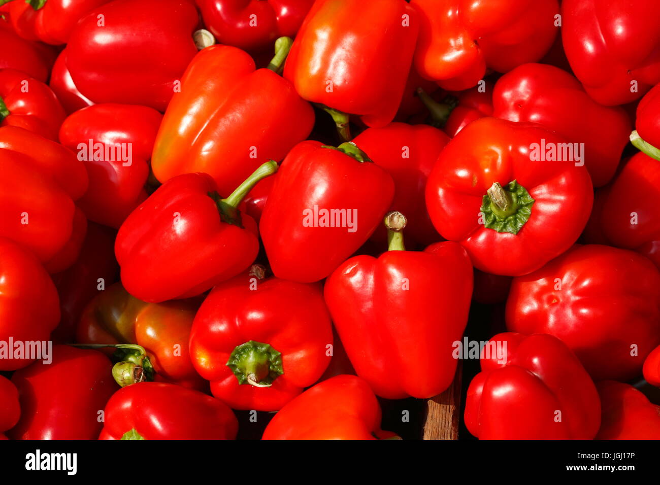 fresh Red peppers on a market stall Stock Photo - Alamy