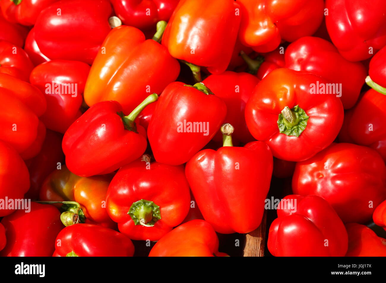fresh Red peppers on a market stall Stock Photo - Alamy