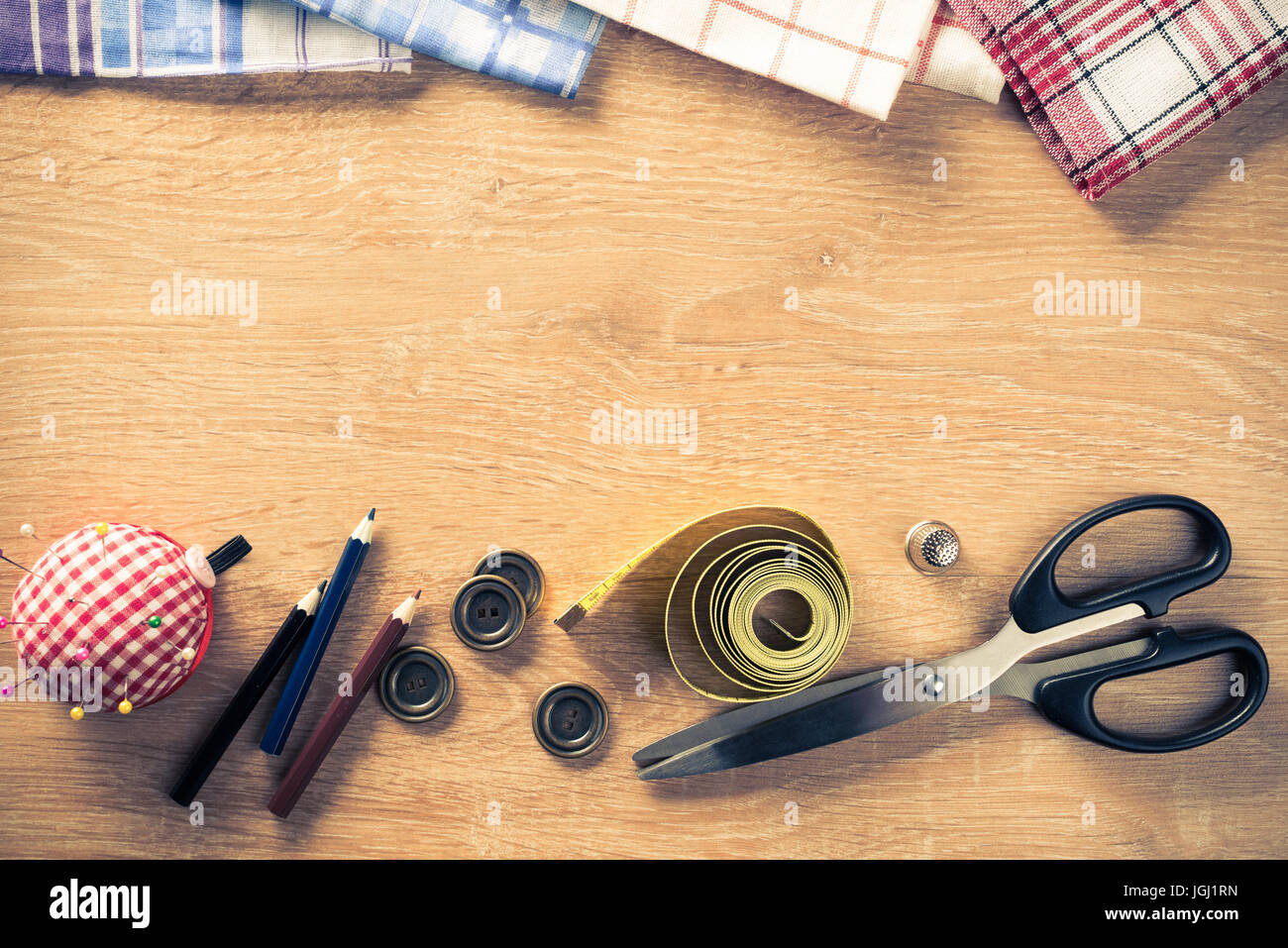Sewing kit on table Stock Photo - Alamy