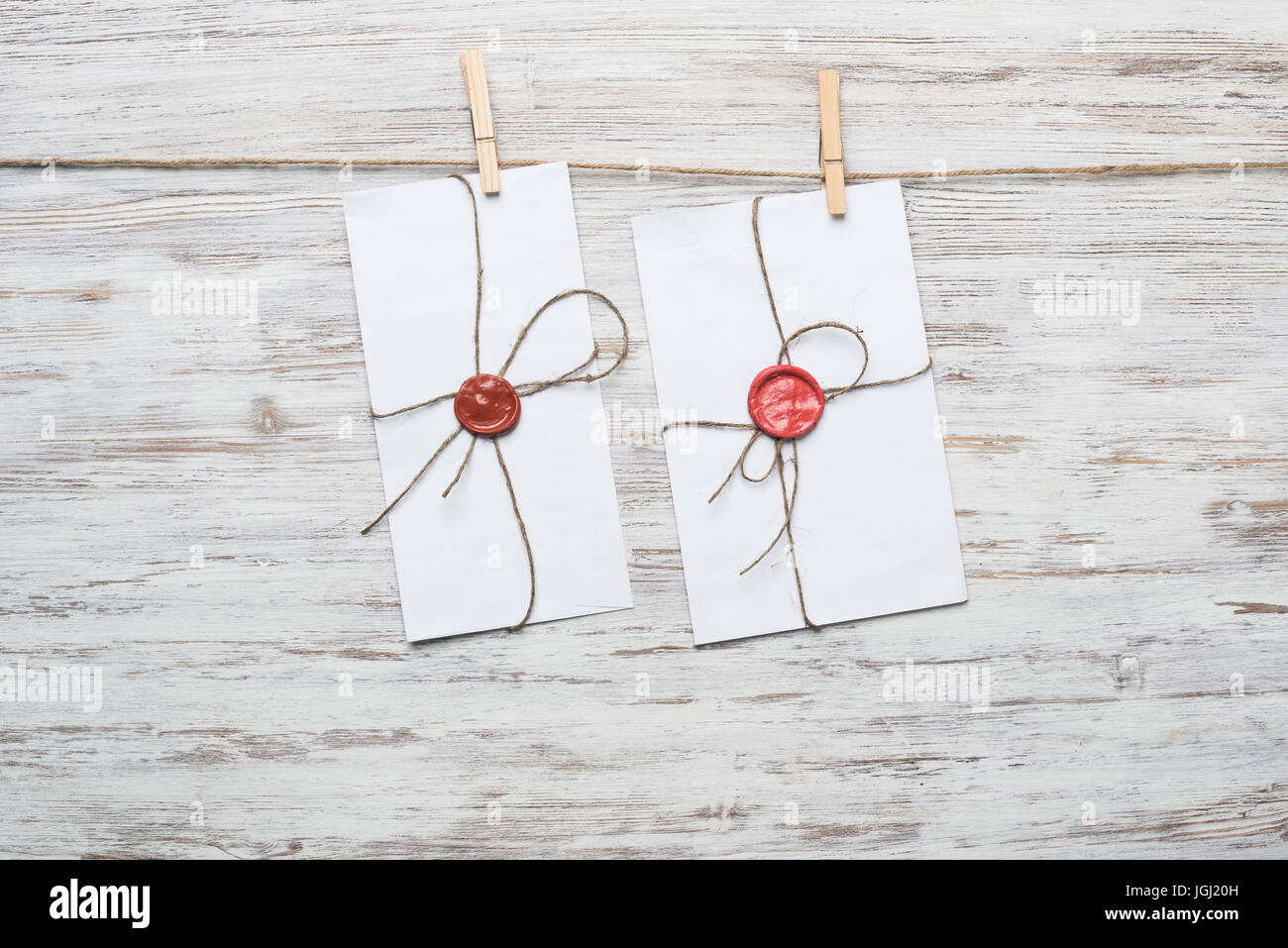 Mail envelope on rope Stock Photo - Alamy