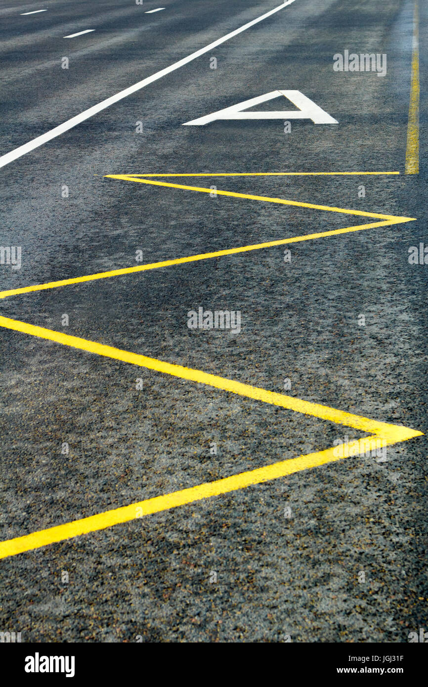 Dedicated lanes for public transport on the carriageway with bus stop ...
