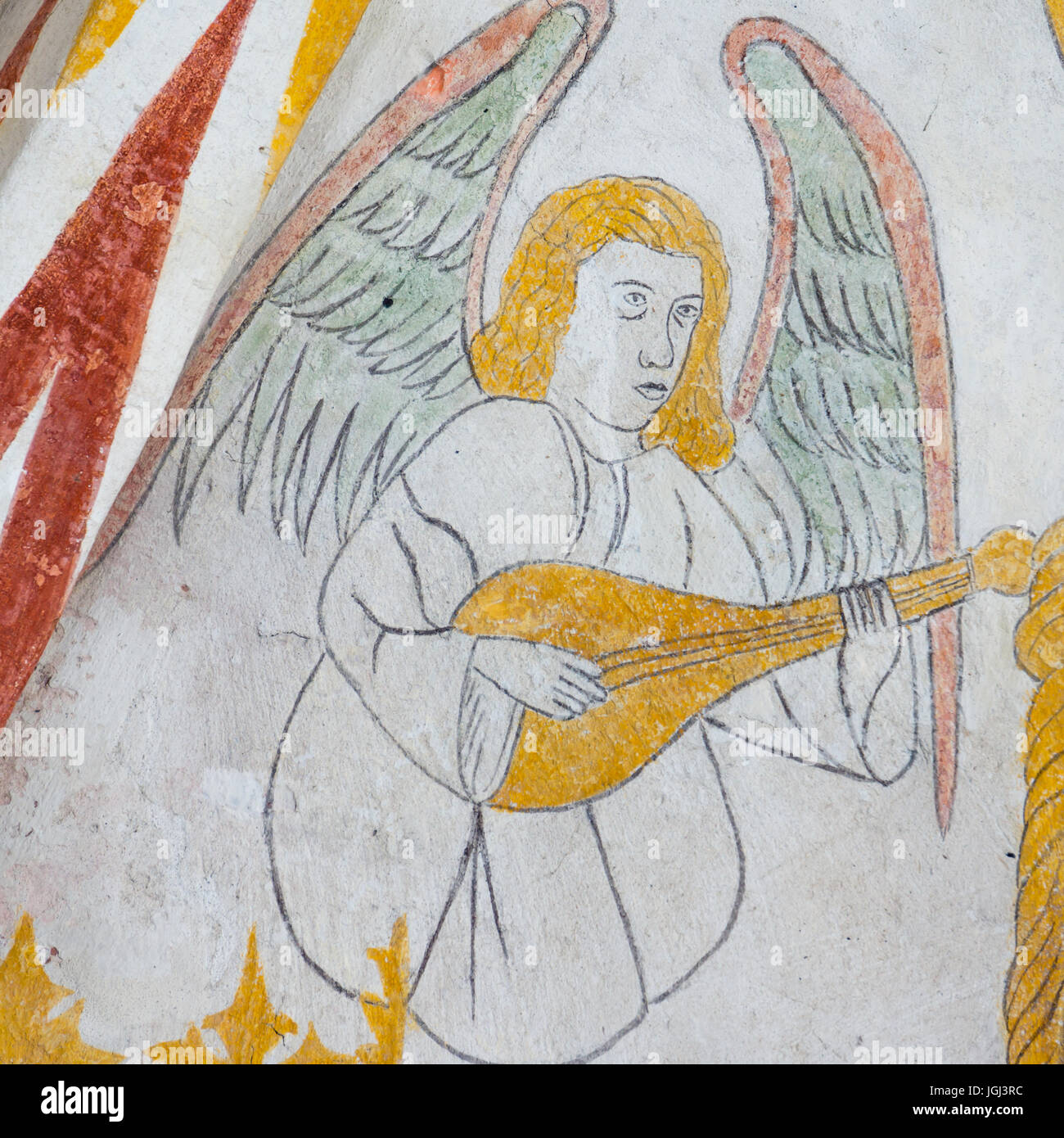 Angel playing the lute, medieval gothic fresco in Vinderslev church ...