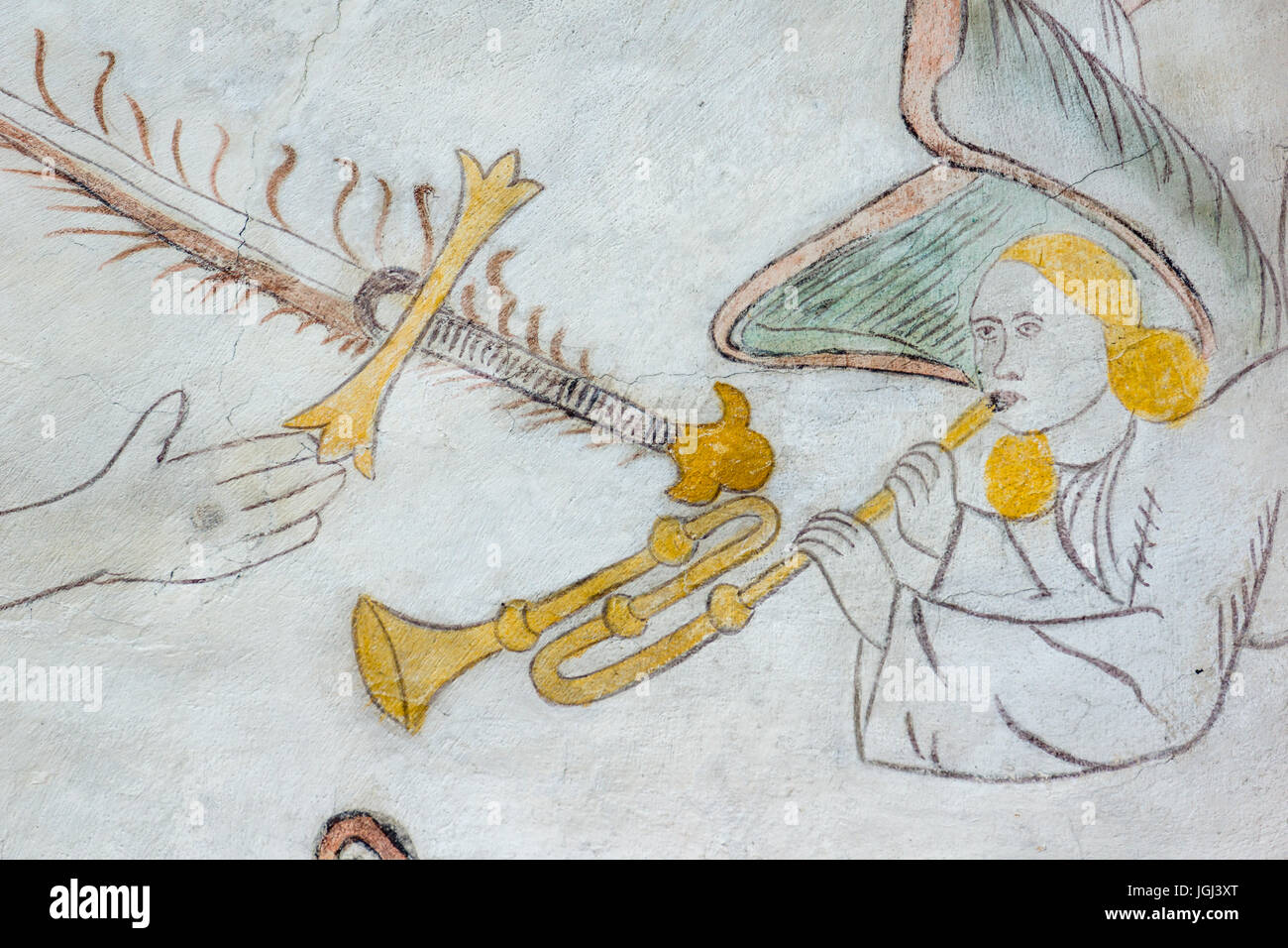 Angel playing the trumpet, medieval gothic wall-painting in Vinderslev ...