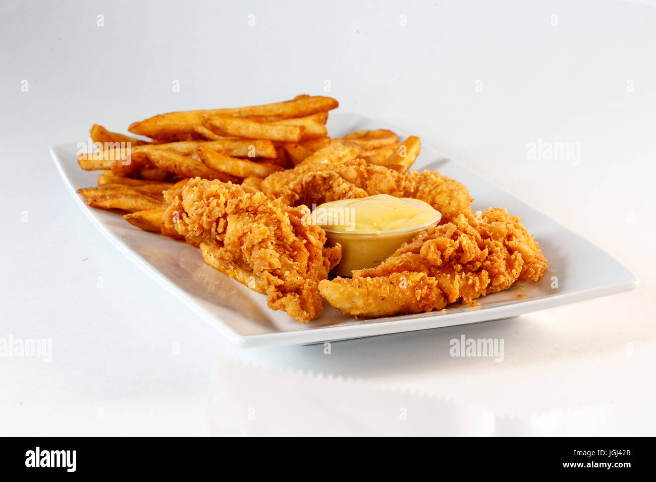 fried chicken fingers/nuggets w/ chips Stock Photo - Alamy