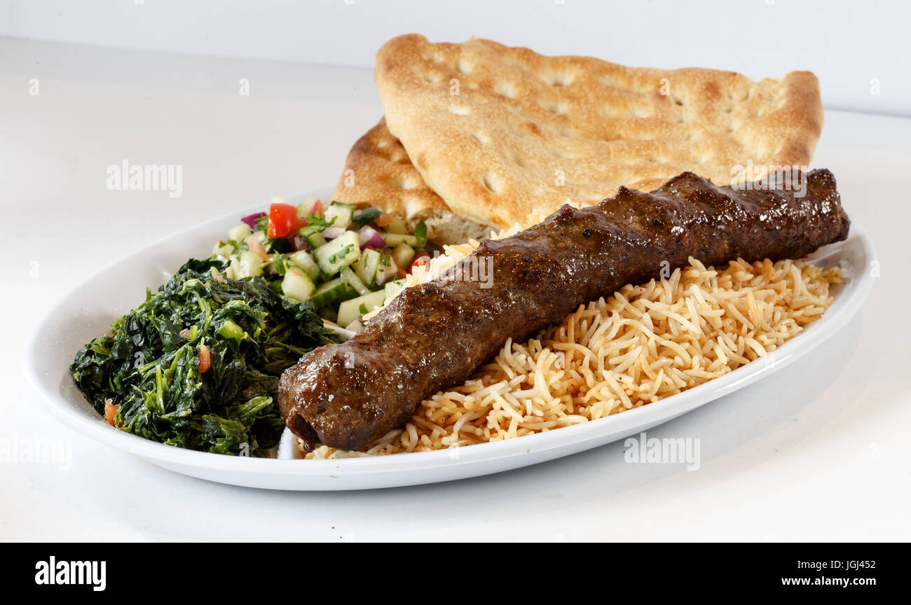 kabob dinner w/ rice and sides Stock Photo - Alamy