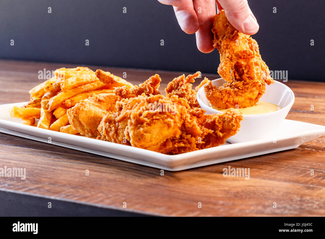 fried chicken fingers/nuggets w/ chips Stock Photo - Alamy