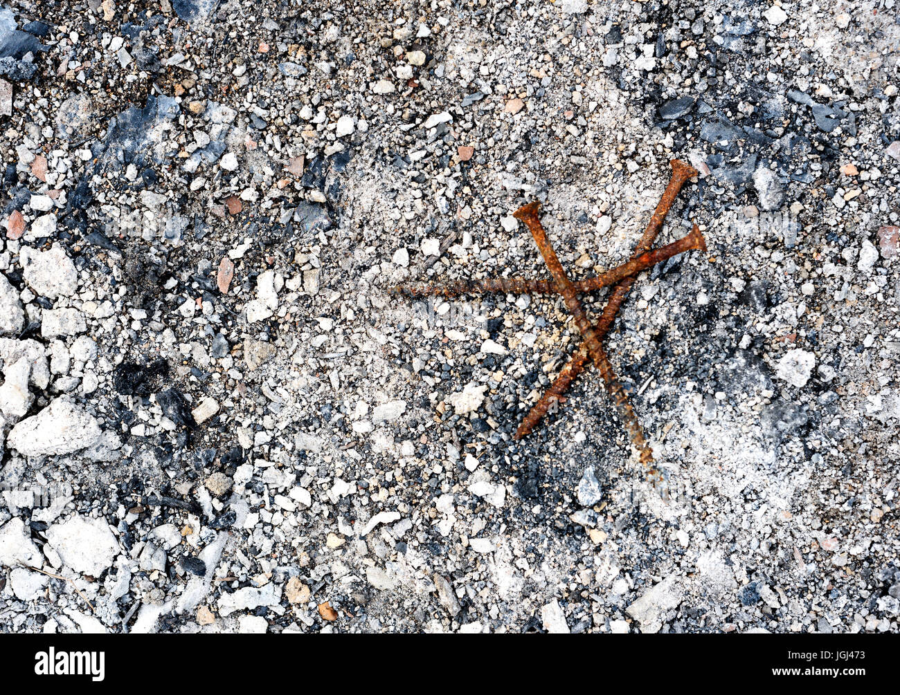 Burnt food can aged with rust sits in the ash remains of a fire Stock ...