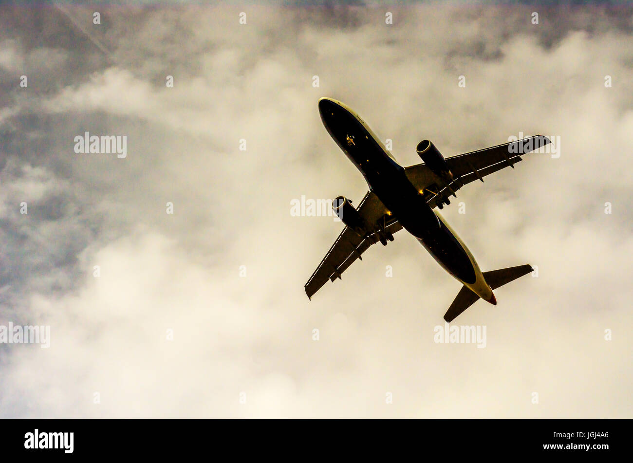 Passenger plane flying in the blue sky with clouds, cruise aircraft ...