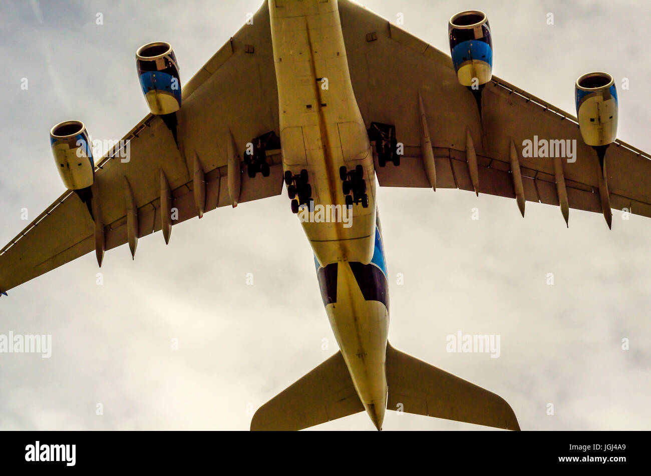 Passenger plane flying in the blue sky with clouds, cruise aircraft ...