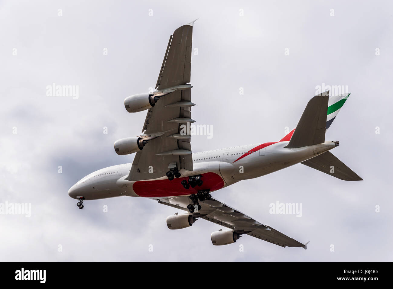 Passenger plane flying in the blue sky with clouds, cruise aircraft ...