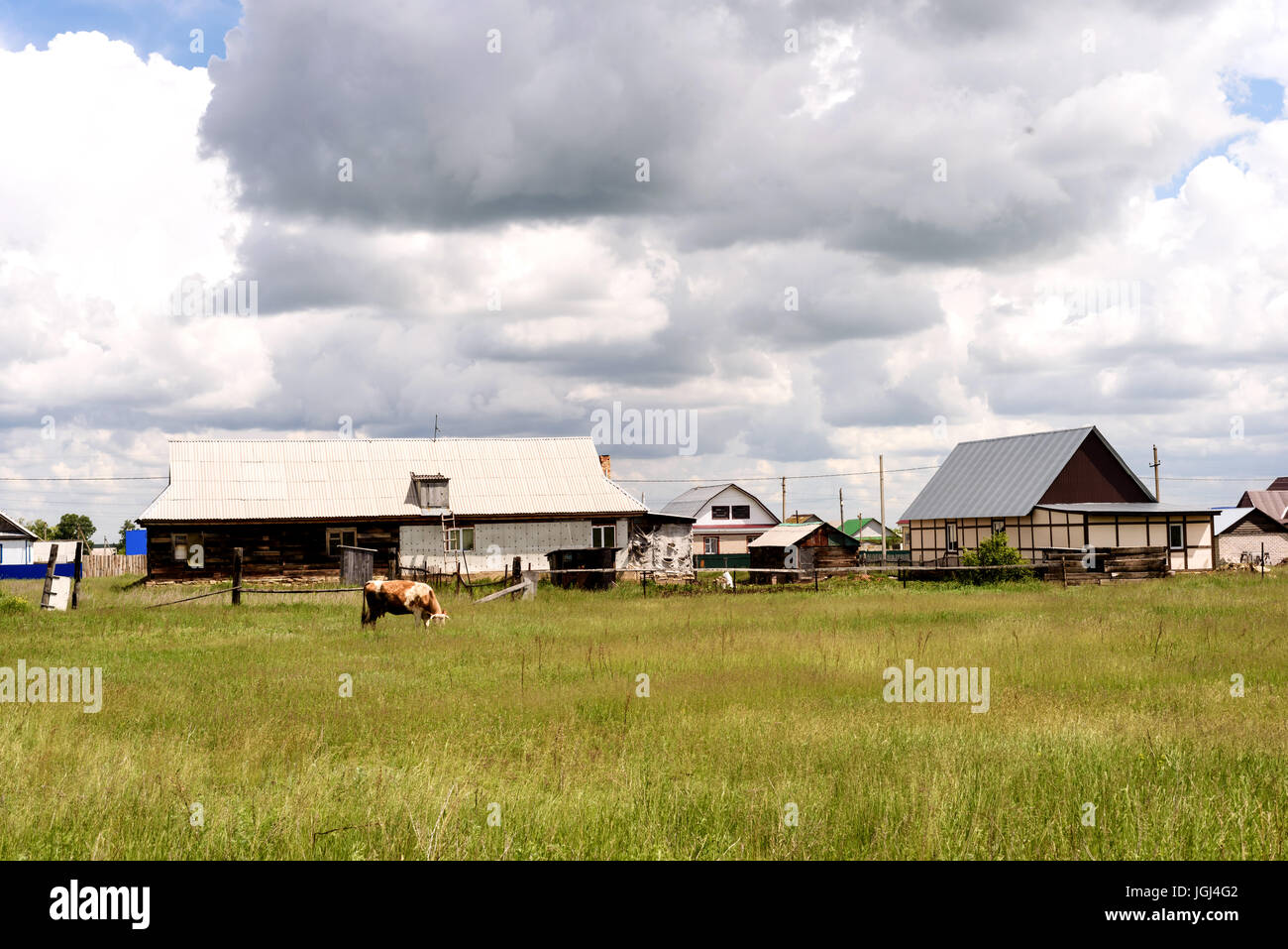 Rural farm buildings in Russia during the summer sun Stock Photo - Alamy
