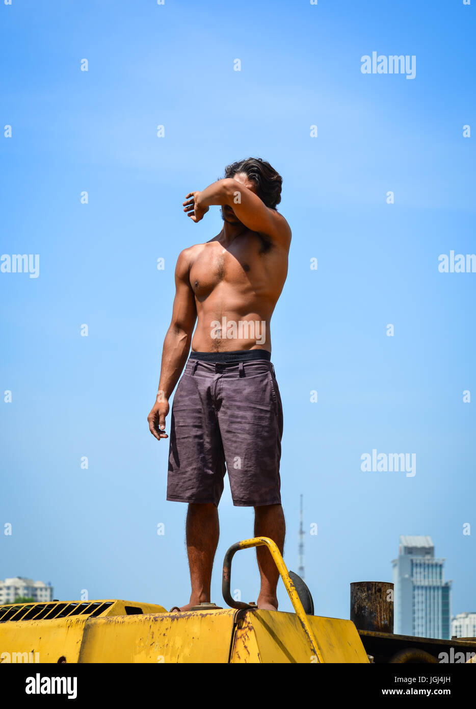 An Indian construction worker feeling tired in relaxing hour Stock ...