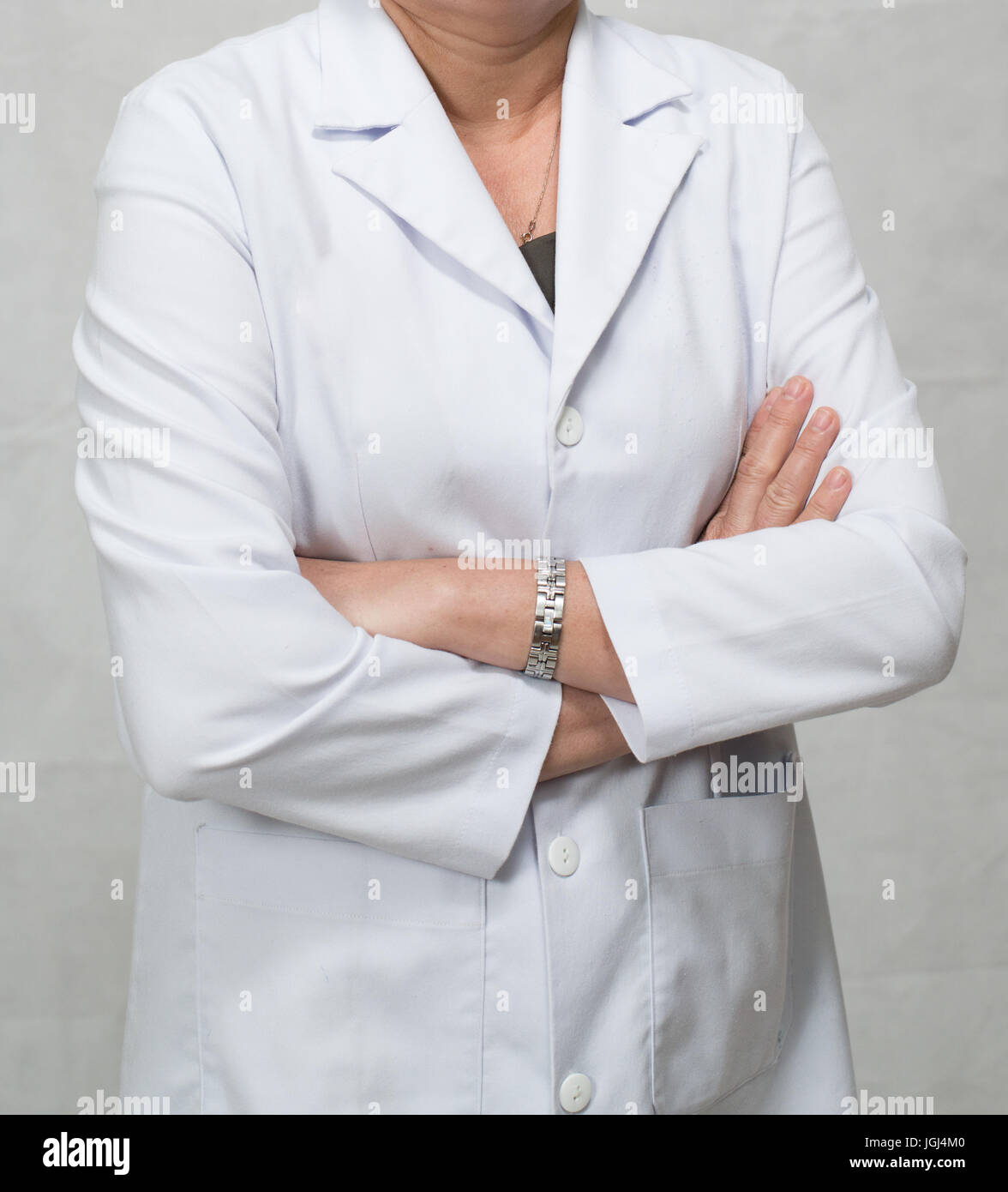 An Asian woman doctor in uniform, half body Stock Photo - Alamy