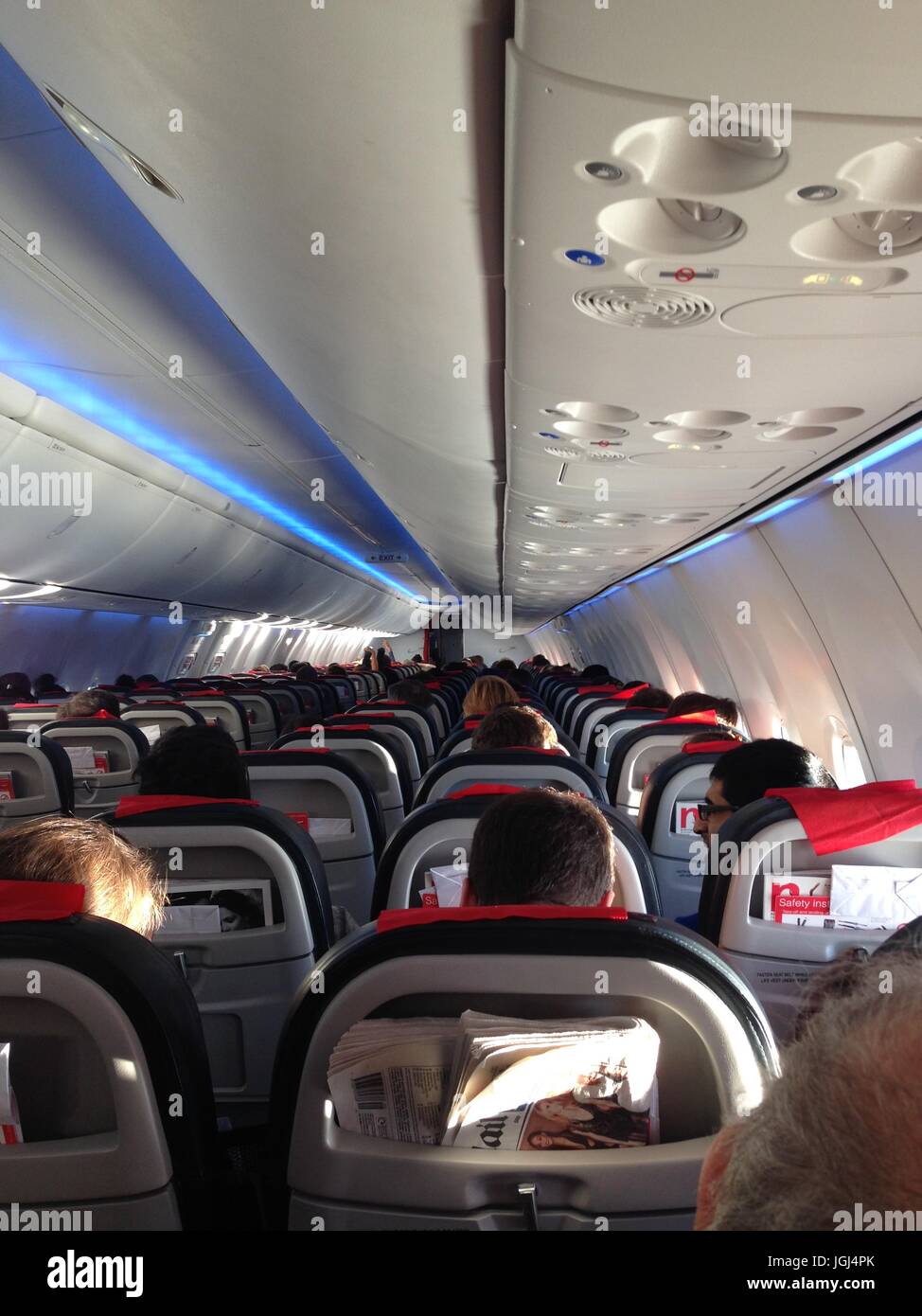 Airplane aircraft plane cabin seats from back of airplane Stock Photo ...