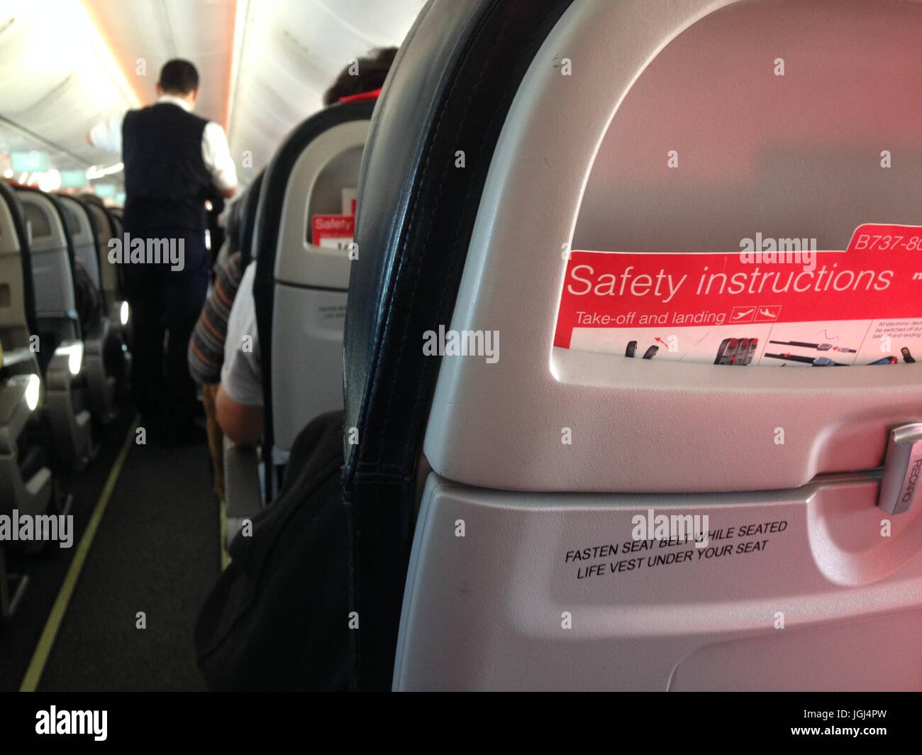 Airplane aircraft plane cabin seats from back of airplane Stock Photo ...