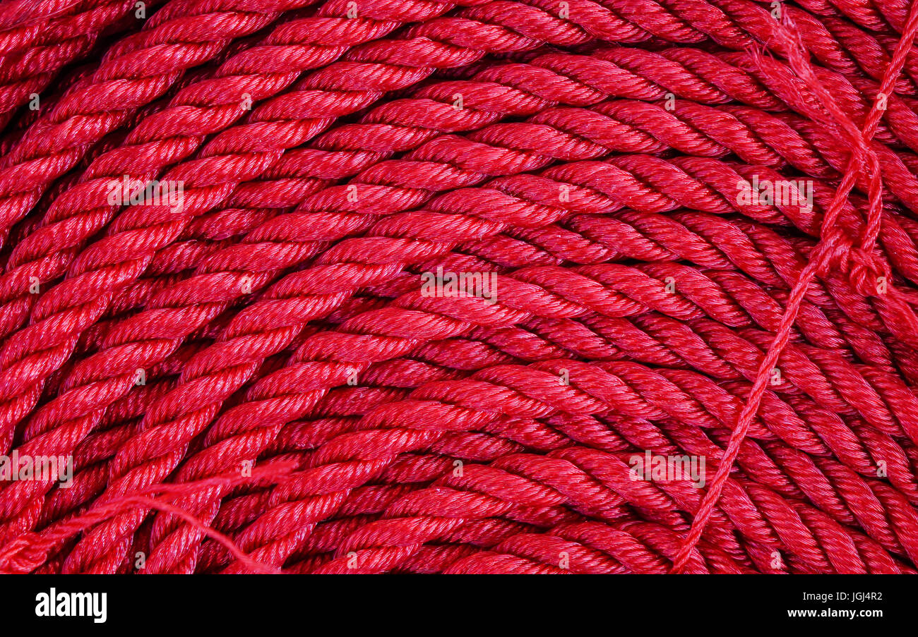 Red rope in piles at the market in Kowloon, Hong Kong. Close up Stock ...