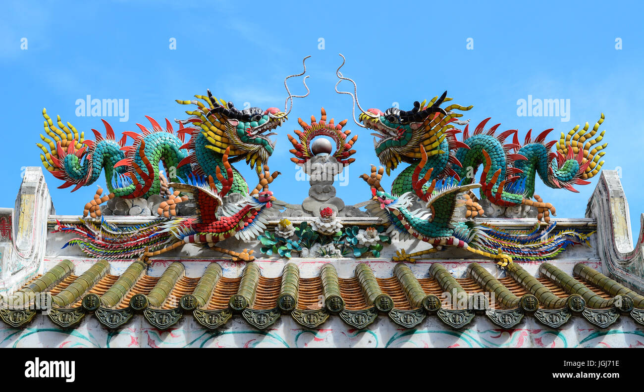 An image of dragon on a roof top of dragon Chinese temple. Dragon ...