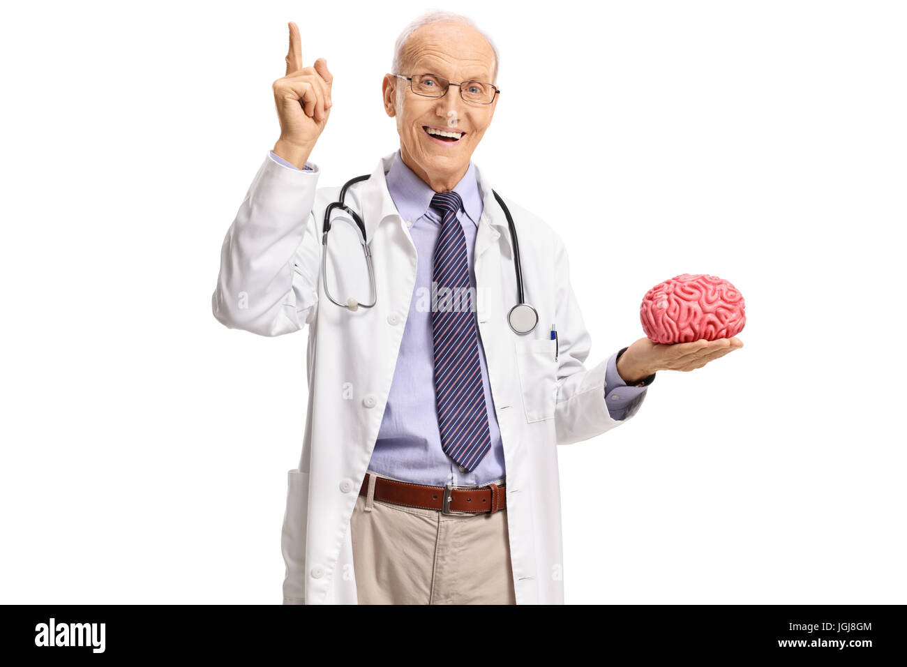 Elderly doctor pointing up with his finger and holding a brain model ...