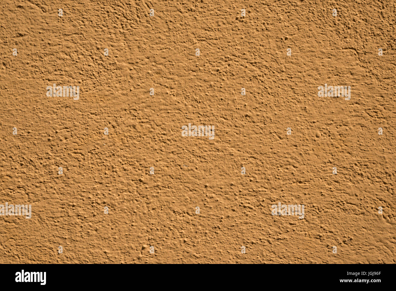Decorative yellow plaster texture on wall, close-up Stock Photo - Alamy