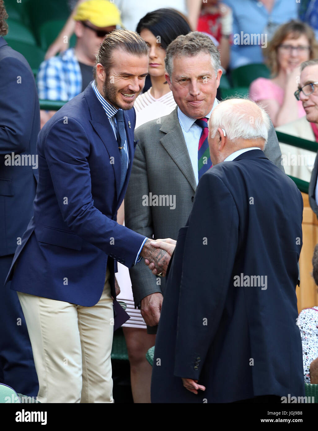 David Beckham arrives in the royal box on day five of the Wimbledon ...